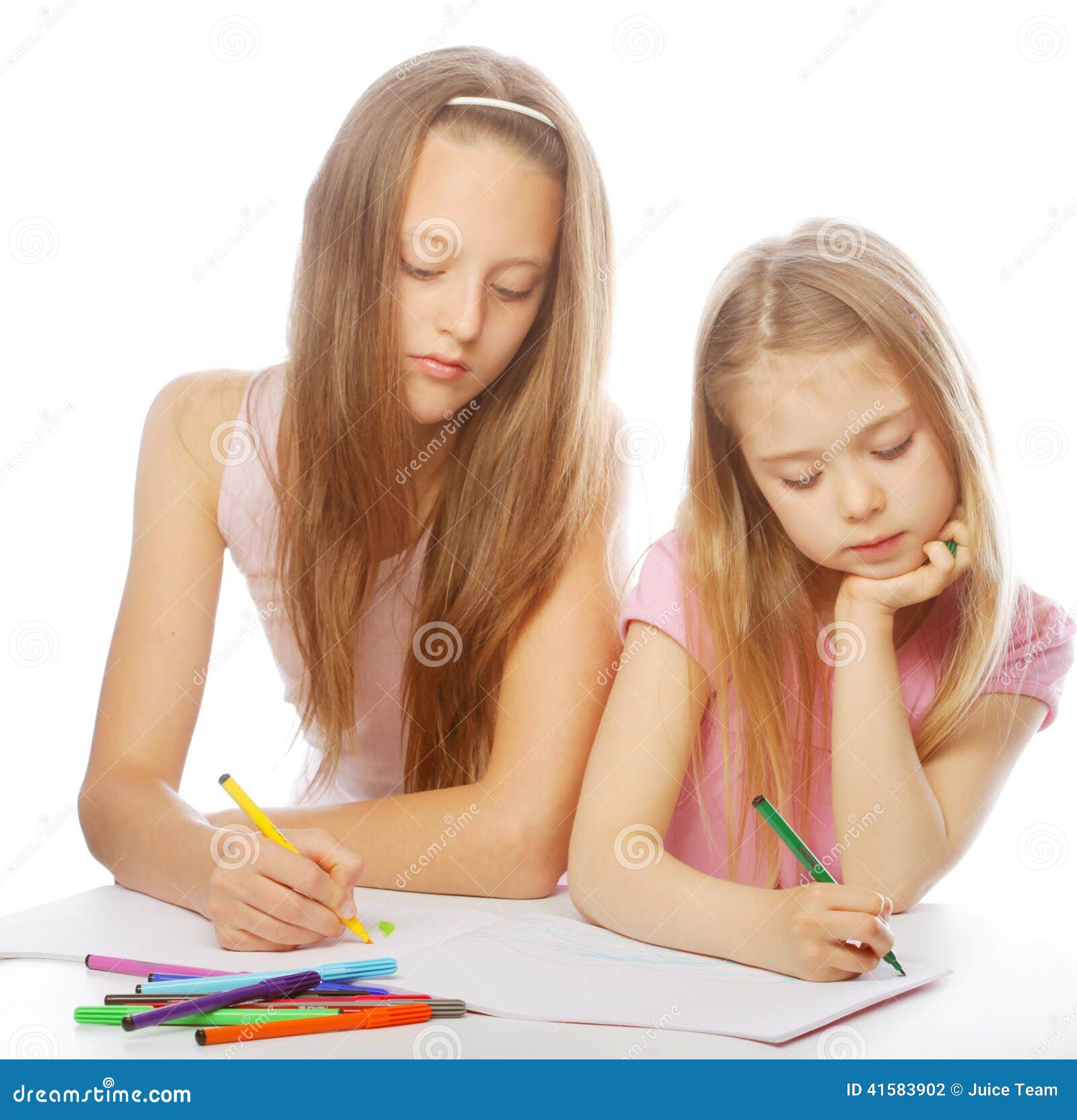 Sisters draw on the album stock photo. Image of friends - 41583902