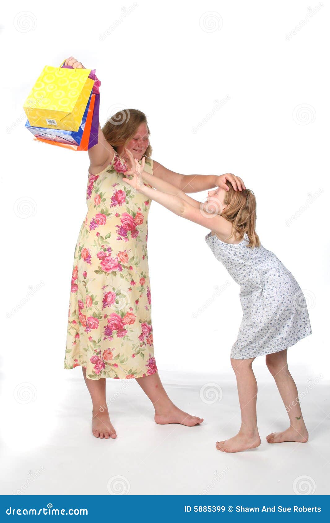Sisters fighting over ball stock image. Image of envy - 5885399