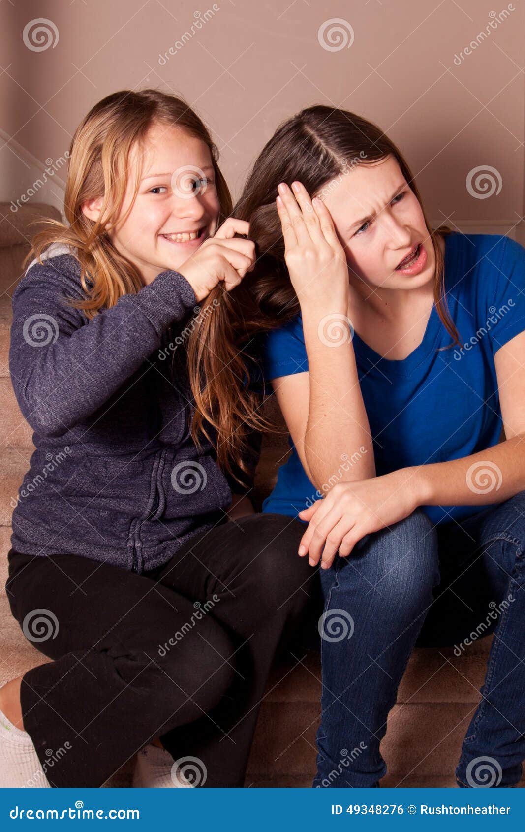 Sisters fighting stock photo. Image of smile, haired - 49348276