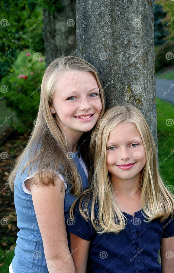 Sisters and Friends #2 stock image. Image of blue, eyes - 2456763