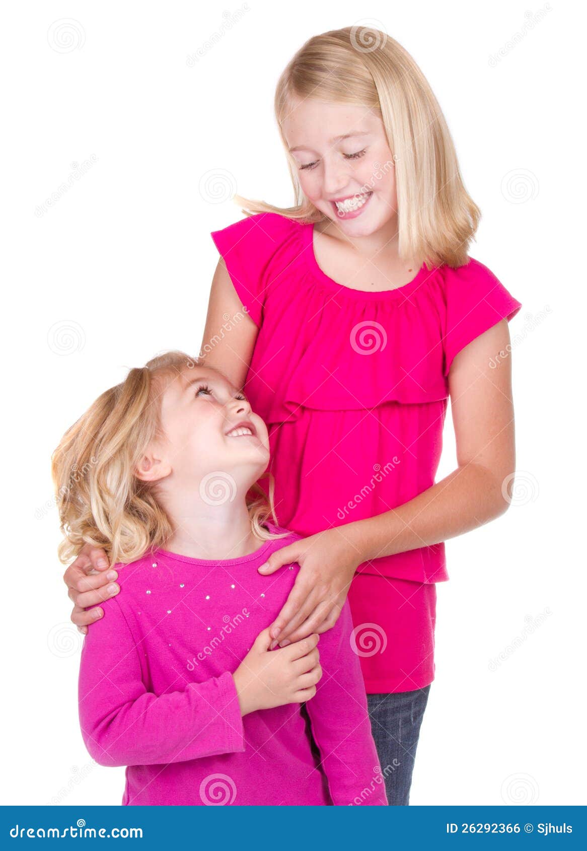 Sisters Hugging and Looking at Each Other Stock Photo - Image of girl ...