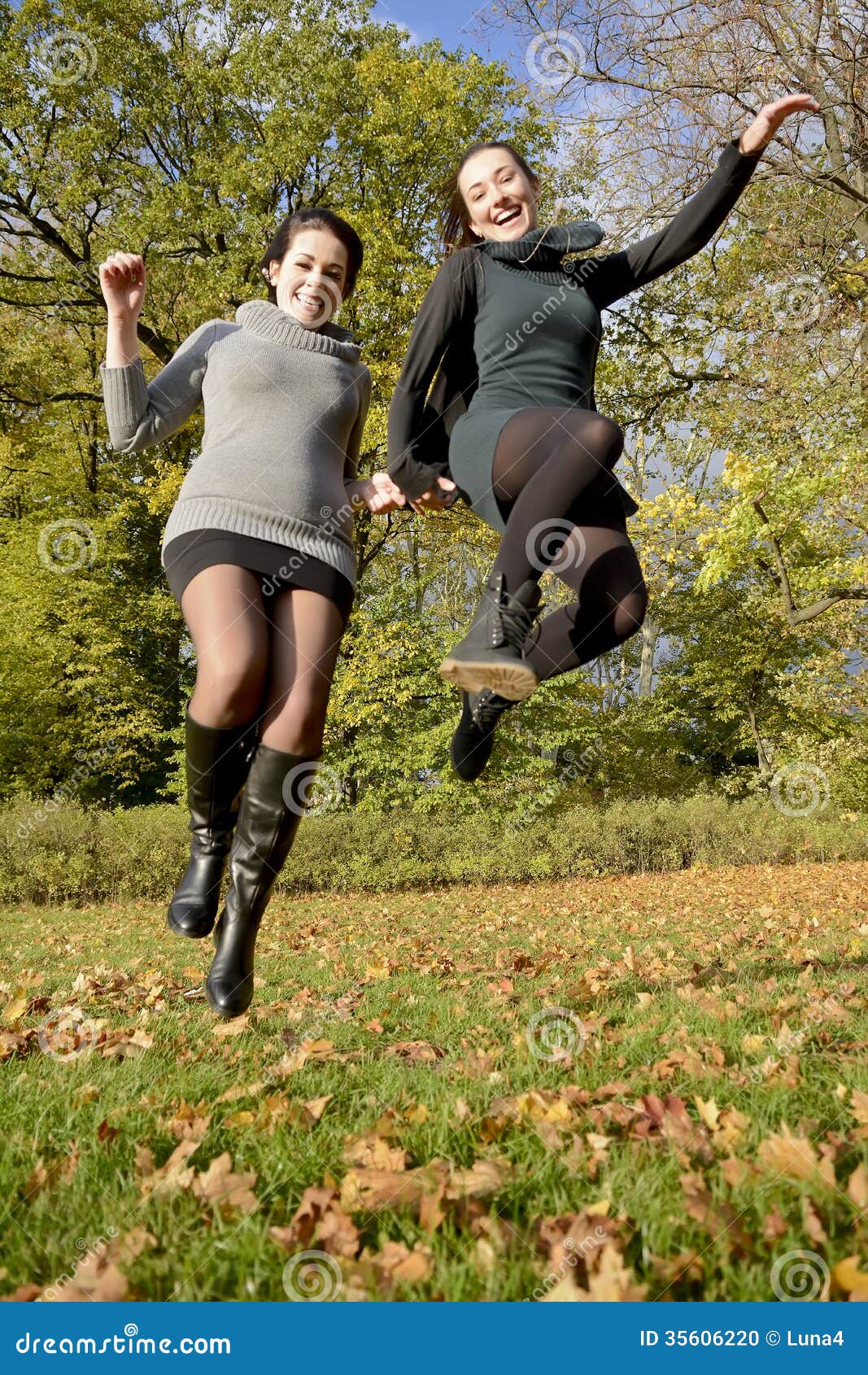 Sisters jumping stock photo. Image of caper, female, leap - 35606220