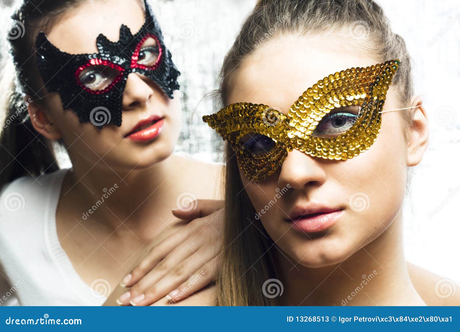 Sisters with masks stock image. Image of adult, party - 13268513