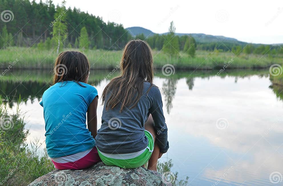 Sisters in nature stock image. Image of contemplating - 20850755