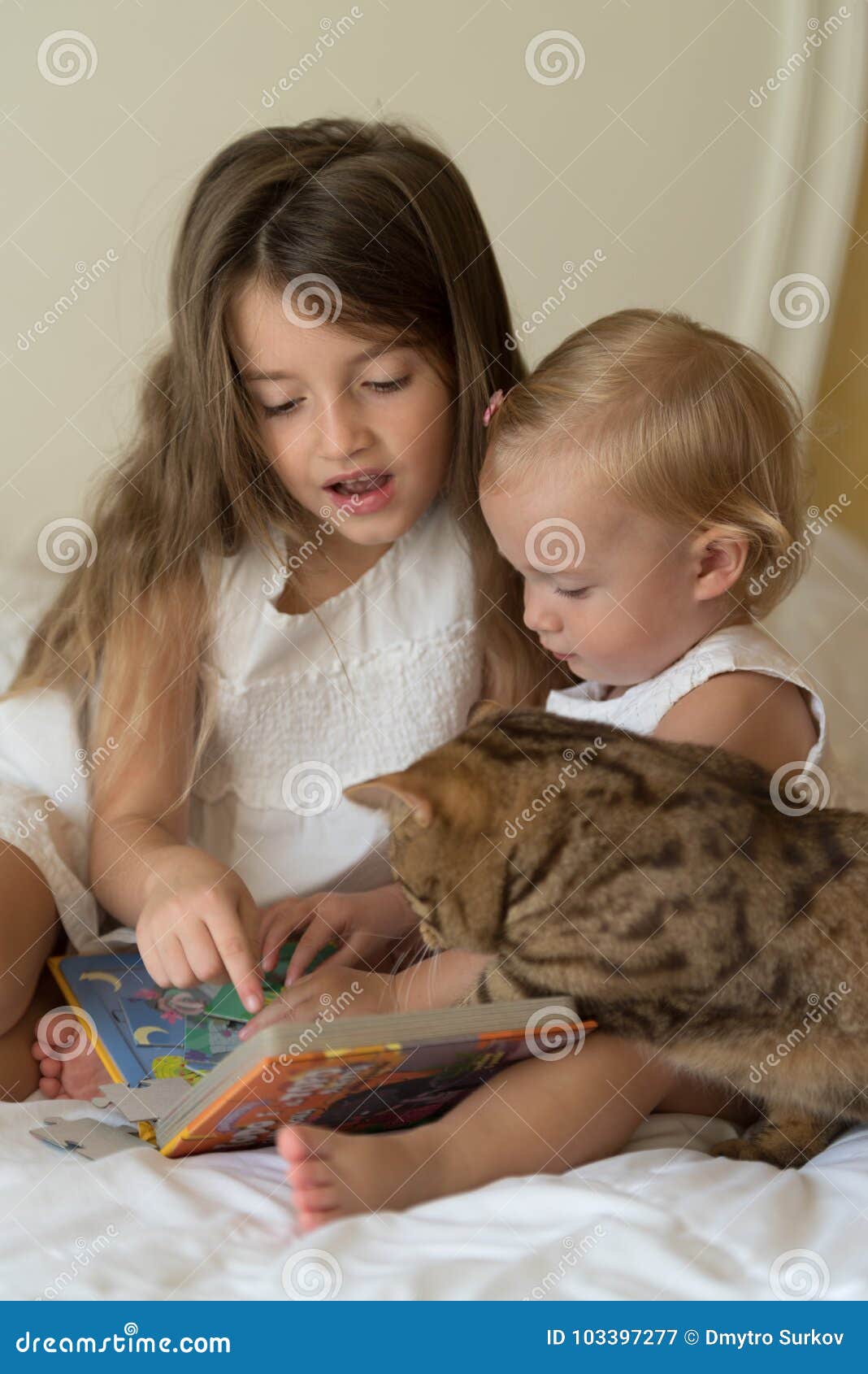 Sisters Reading Book Together Stock Image - Image of parents, reading ...
