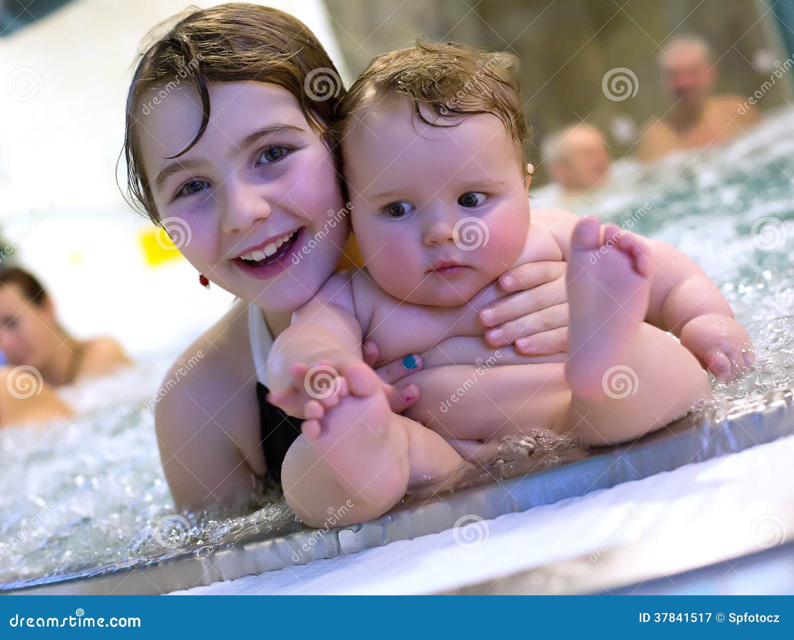 Sisters in pool stock image. Image of offspring, holiday - 37841517