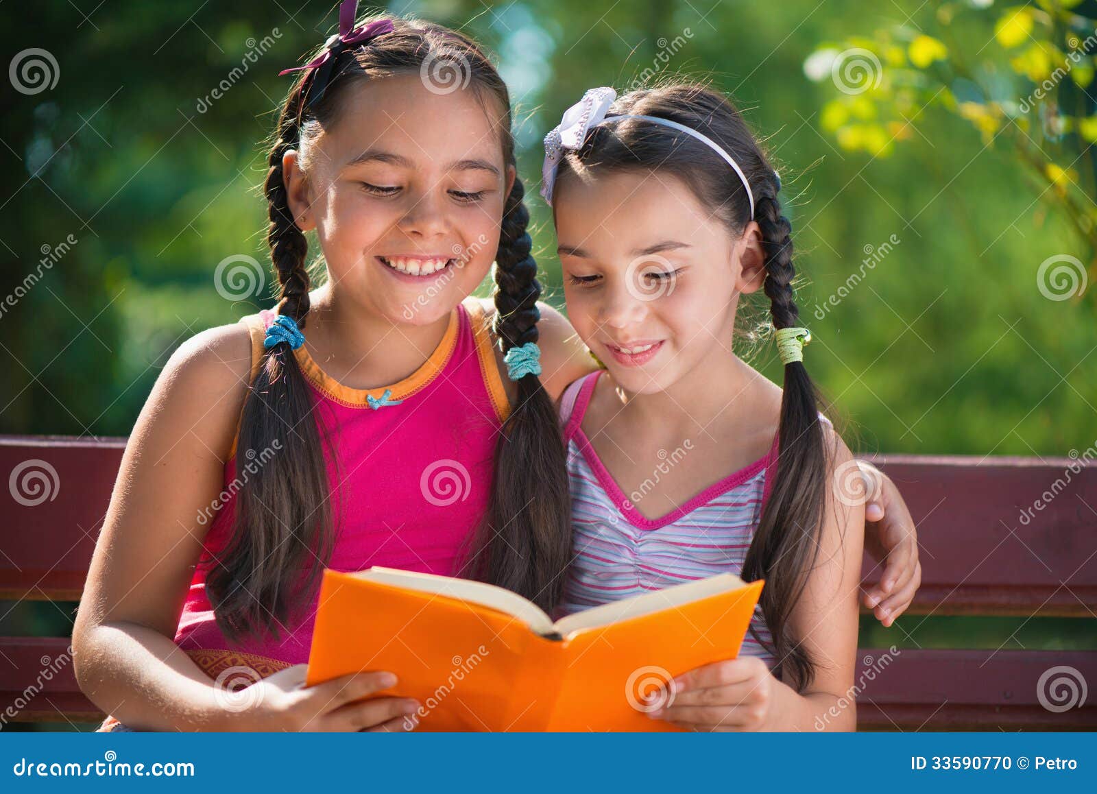 Sisters Reading Book in Summer Park Stock Photo - Image of learning ...