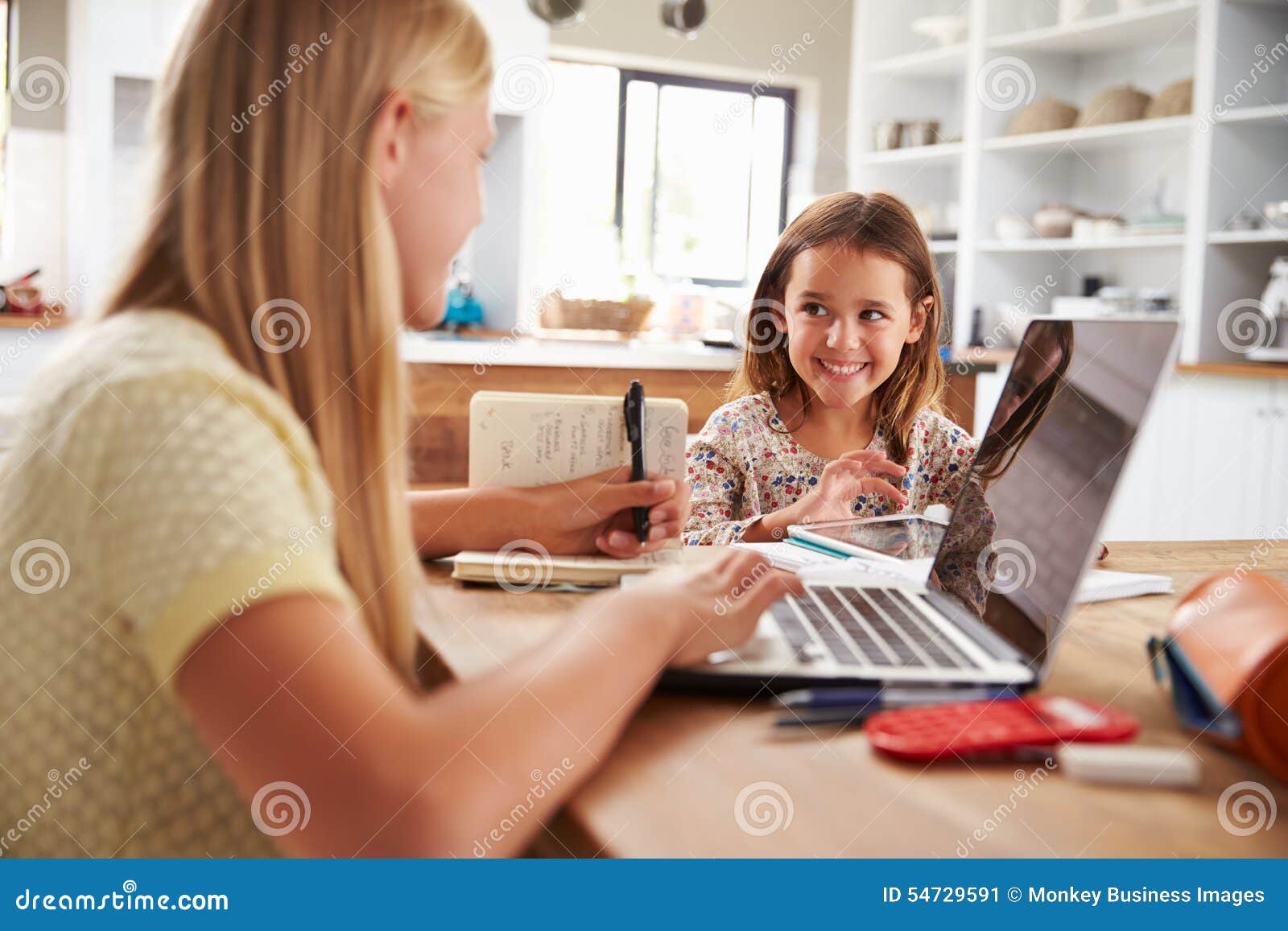Sisters Spending Time Together with Computers at Home Stock Image ...