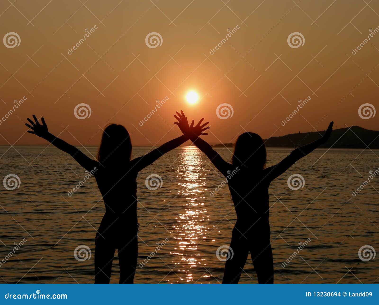Sisters in sunset stock photo. Image of happy, bathing - 13230694