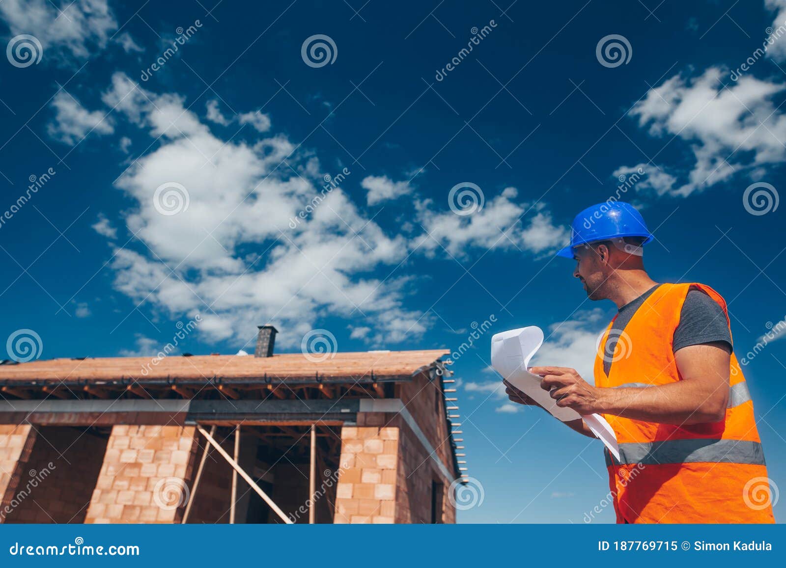 Site Construction Architect Overseeing Construction New Building with a ...