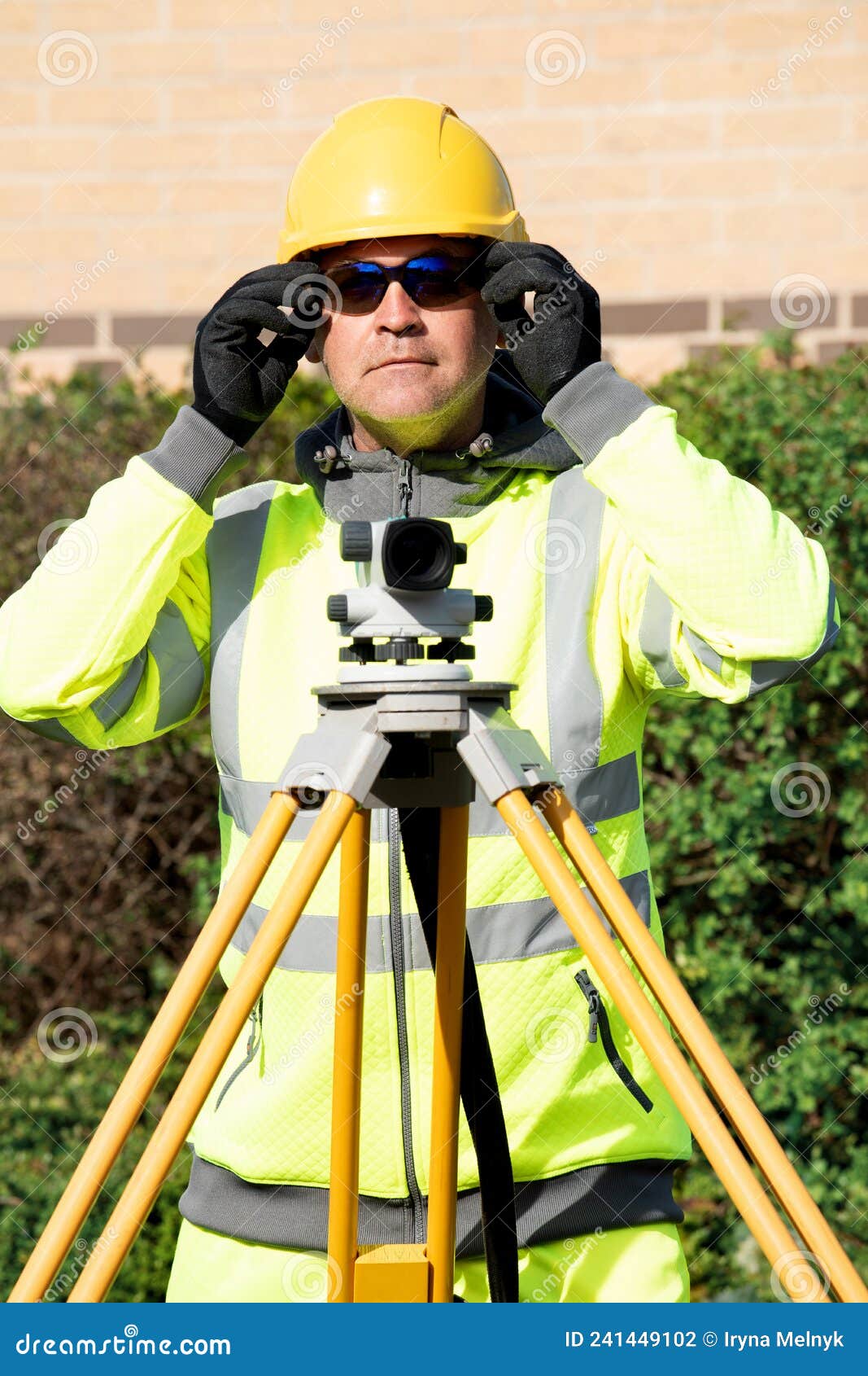 Site Engineer Checking Levels of the Road Using Autolevel Stock Photo ...