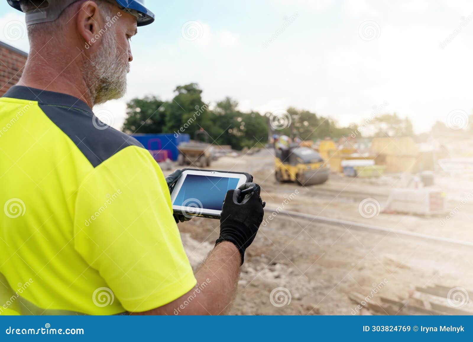 Site Engineer Surveyor Using Rugged Tablet Controller Computer To ...