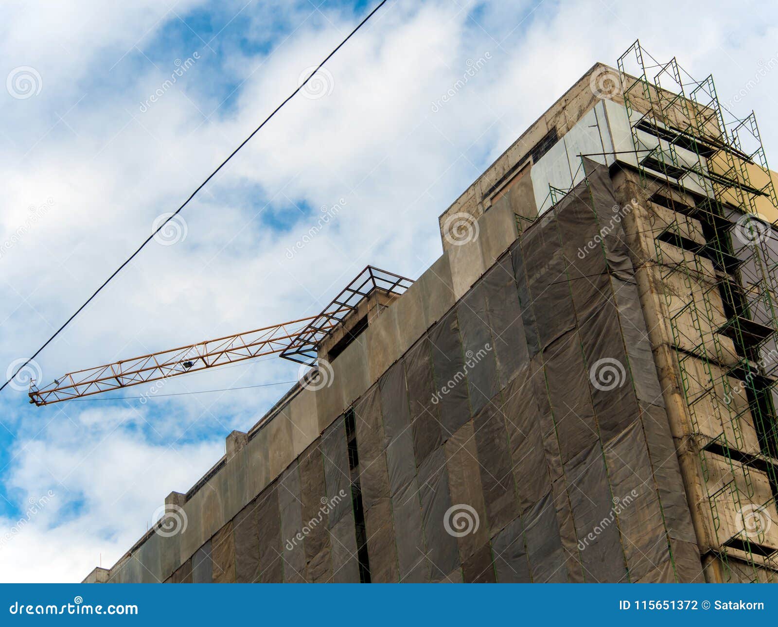 Several Large Canvases Stretch Together, Covered Building Under Stock ...