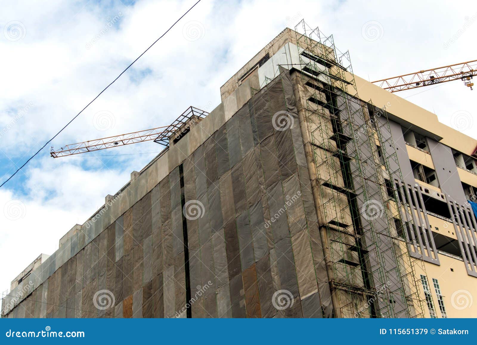 Several Large Canvases Stretch Together, Covered Building Under Stock ...