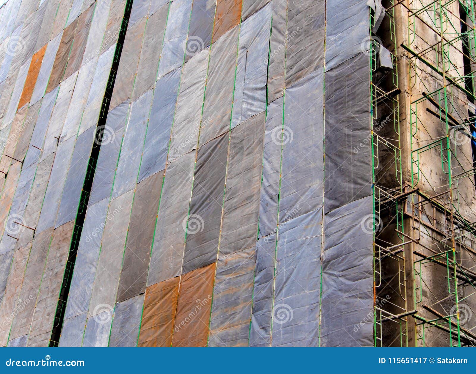 Several Large Canvases Stretch Together, Covered Building Under Stock ...