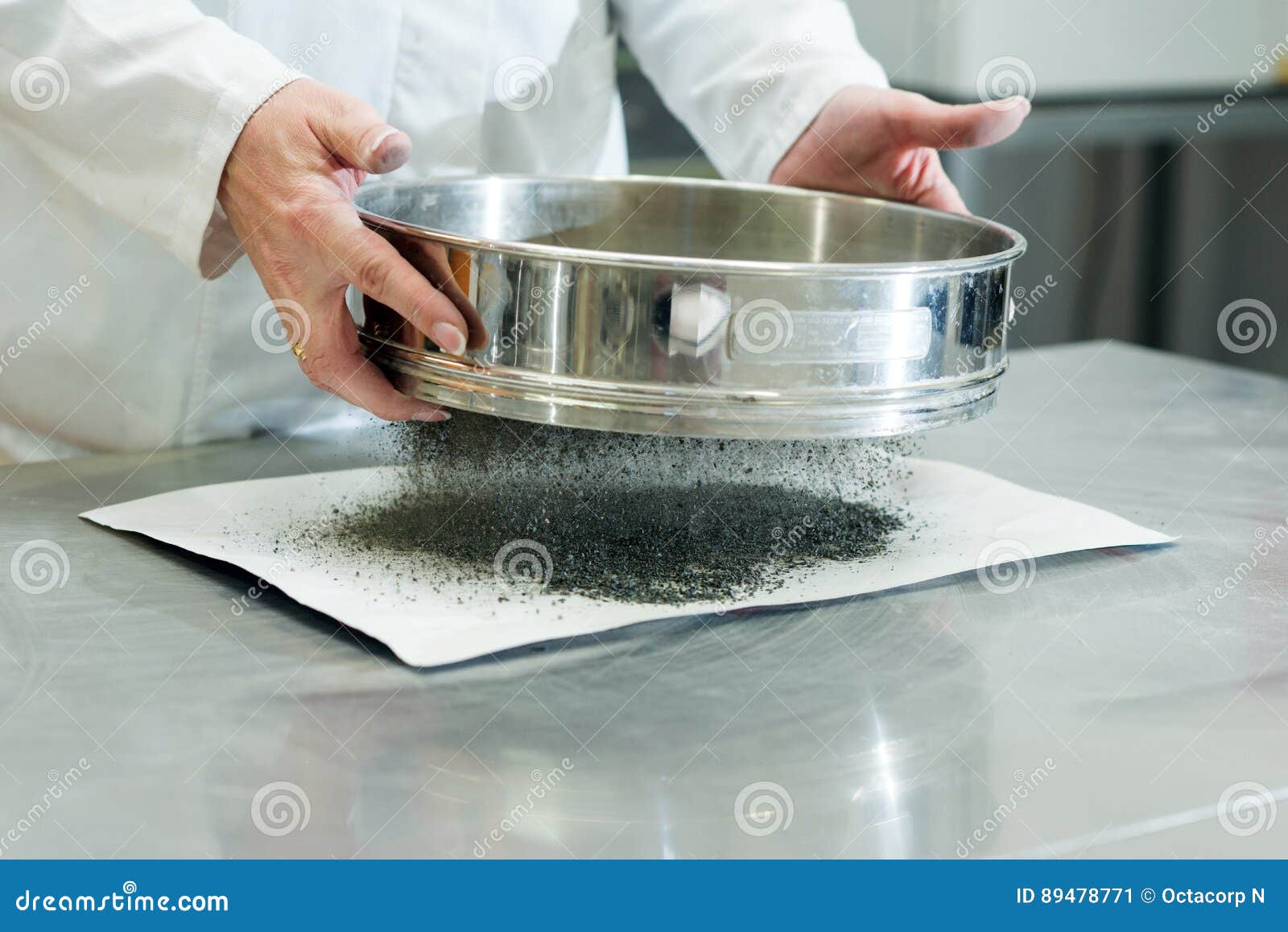 On Site Road Testing Laboratory. Placing Sample of Gravel into a Stock ...