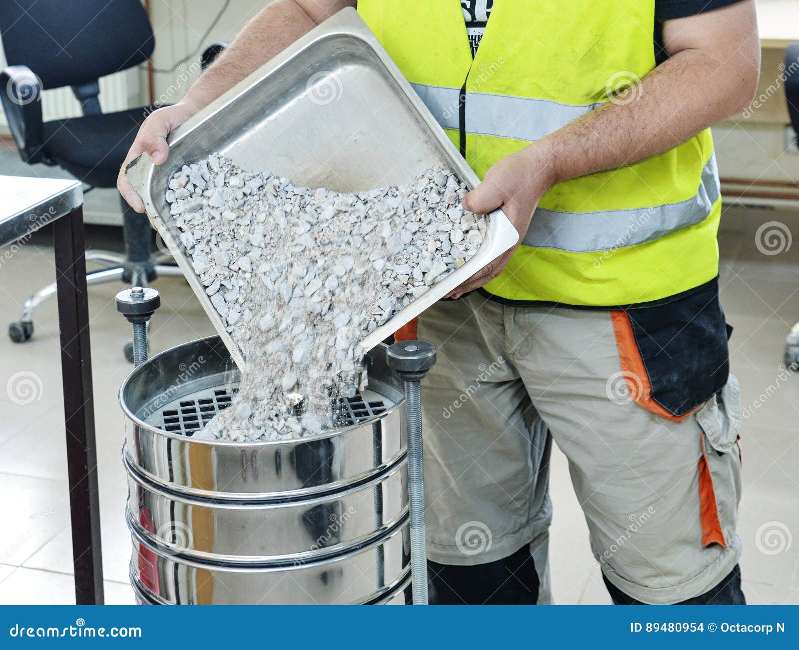 On Site Road Testing Laboratory. Placing Sample of Gravel into a Stock ...