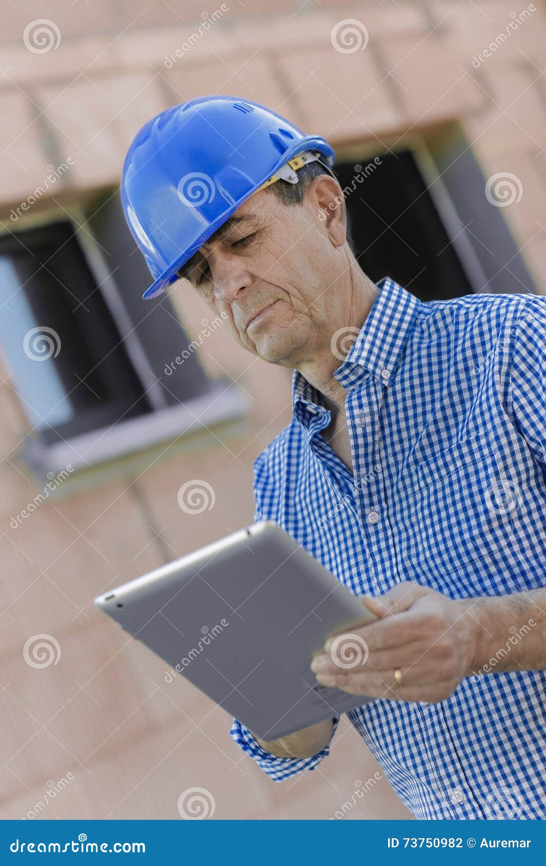 Site surveyor using tablet stock photo. Image of people - 73750982