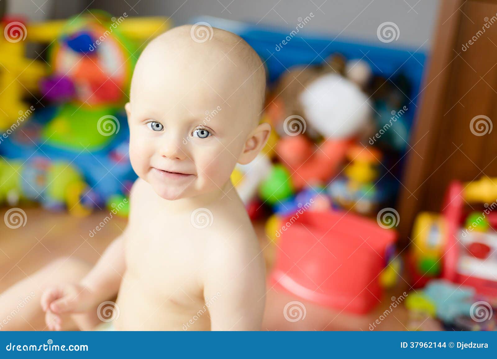 Sitting Baby Smiling Having Fun at Home Stock Photo - Image of activity ...