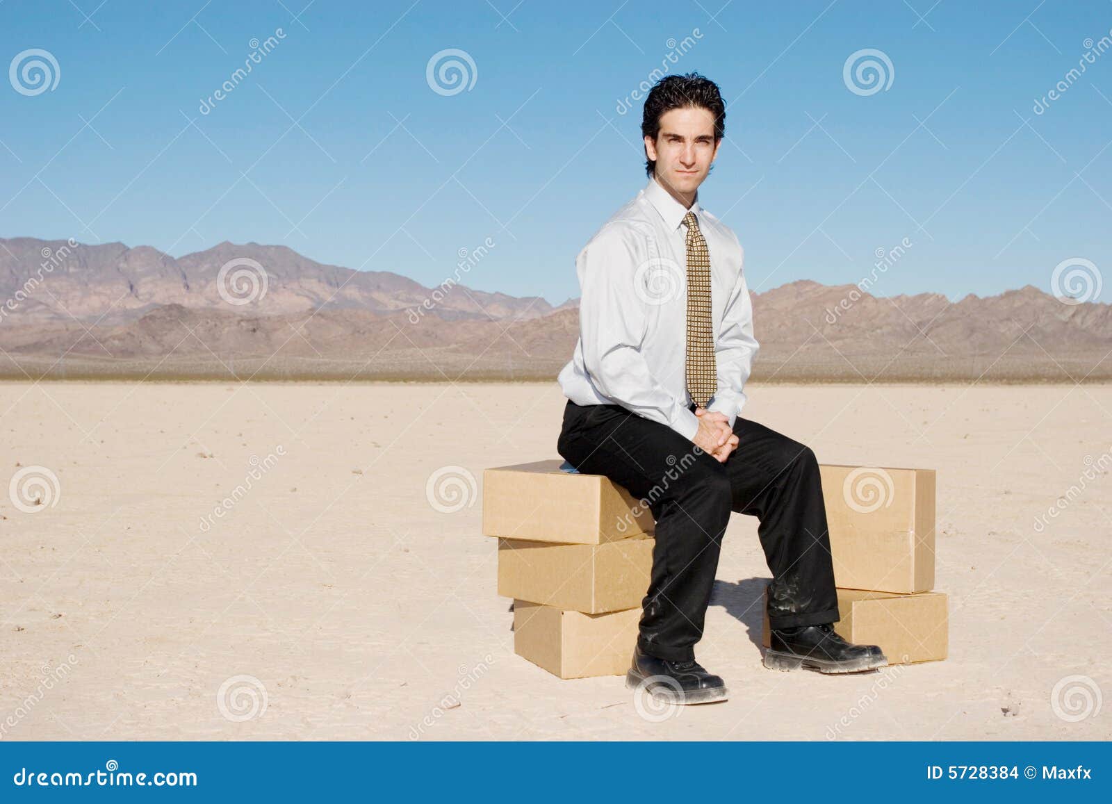 Sitting on boxes stock photo. Image of serious, decision - 5728384
