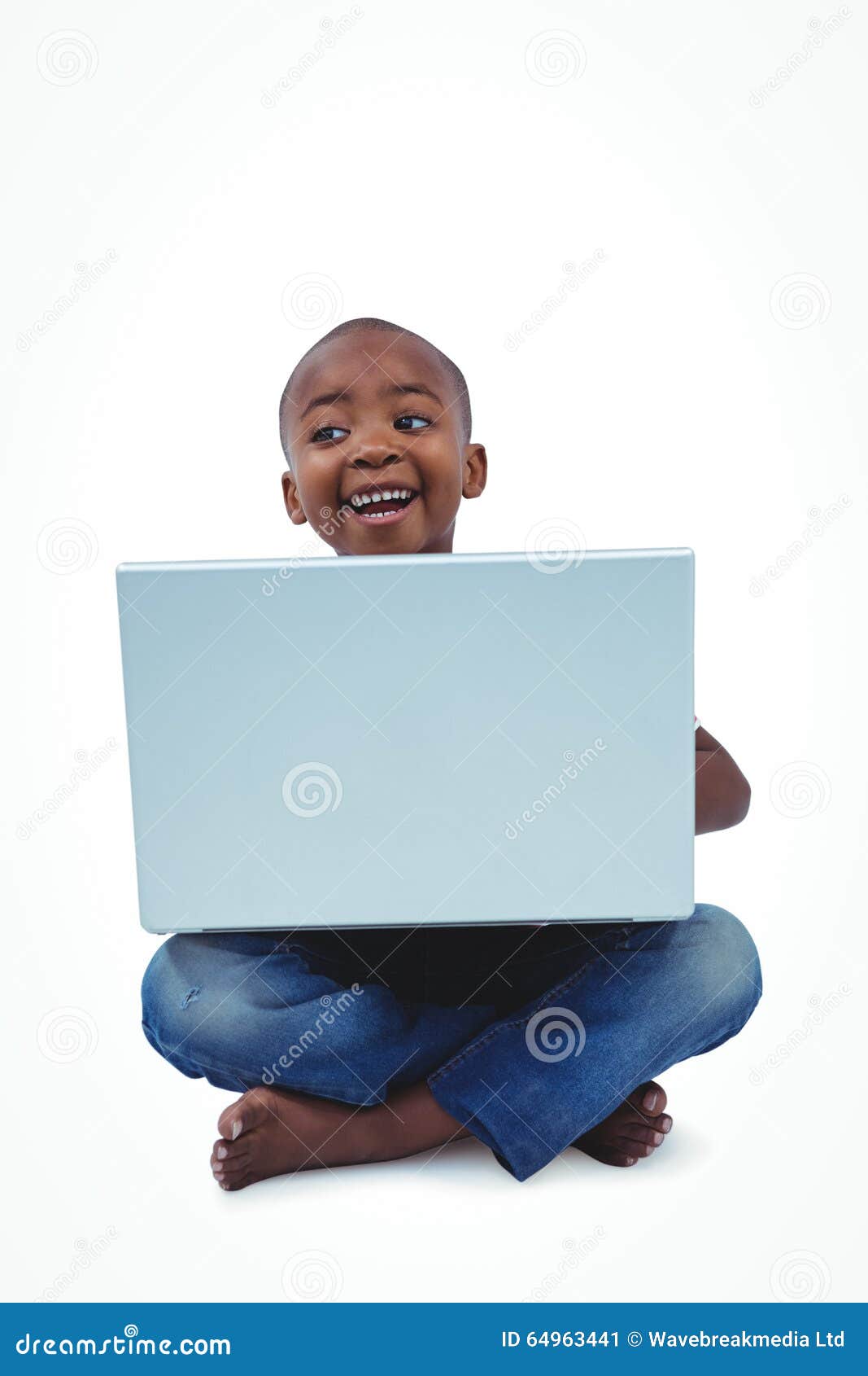 Sitting boy using laptop stock image. Image of laptop - 64963441