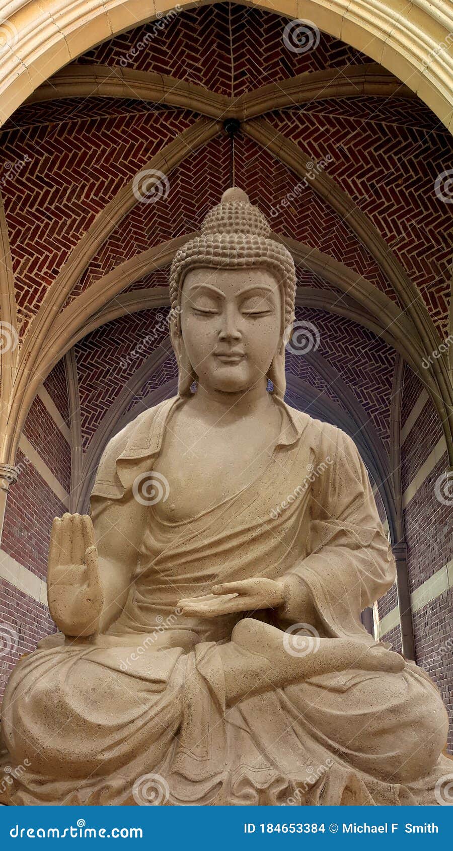 Sitting Buddha in Lotus Position Infront of a Alcove Stock Photo ...