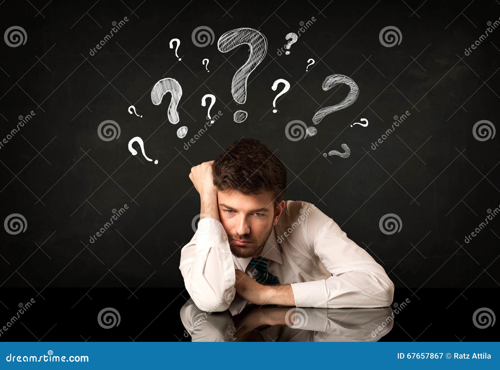 Sitting Businessman Under Question Marks Stock Image - Image of ...