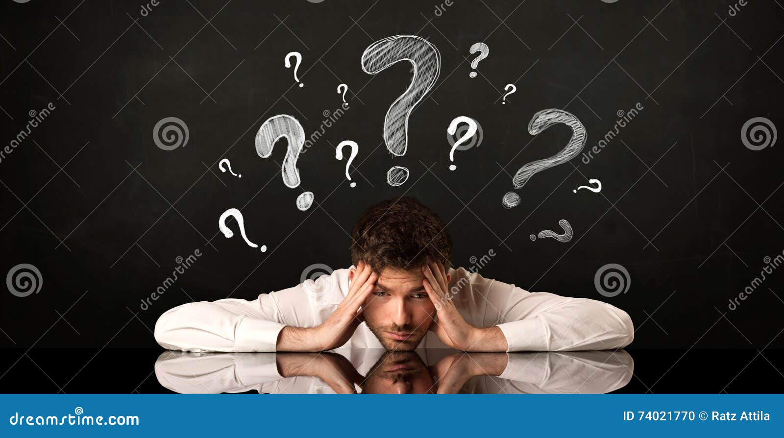 Sitting Businessman Under Question Marks Stock Photo - Image of decide ...