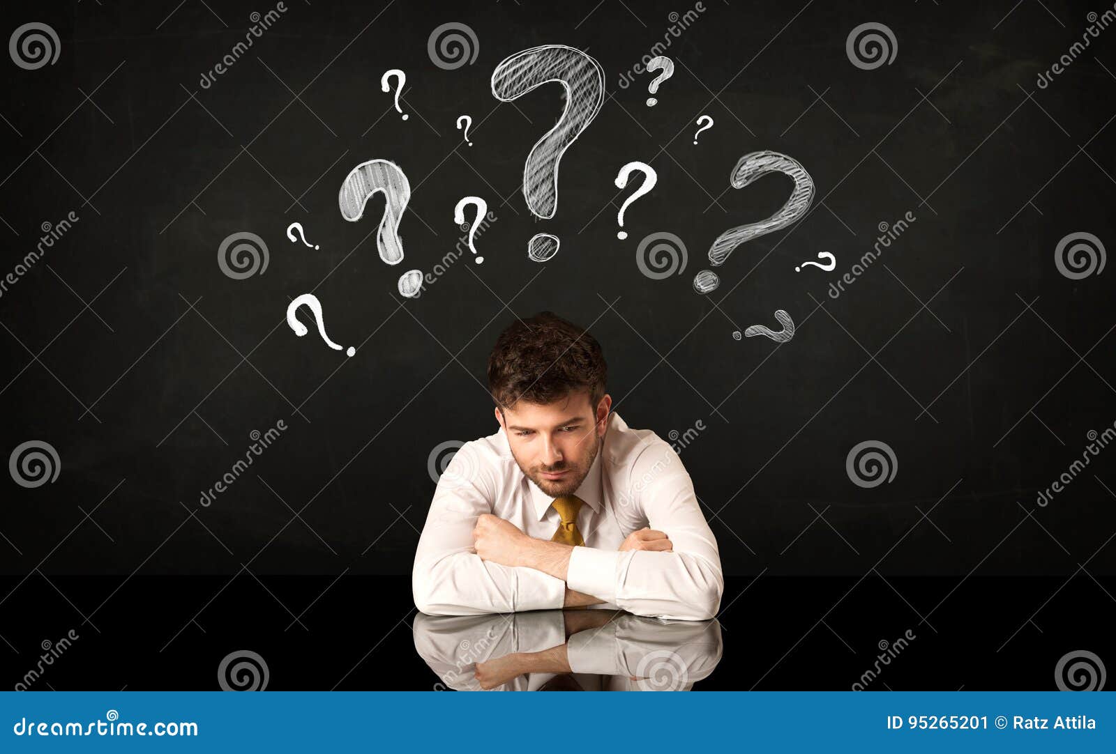 Sitting Businessman Under Question Marks Stock Image - Image of ...