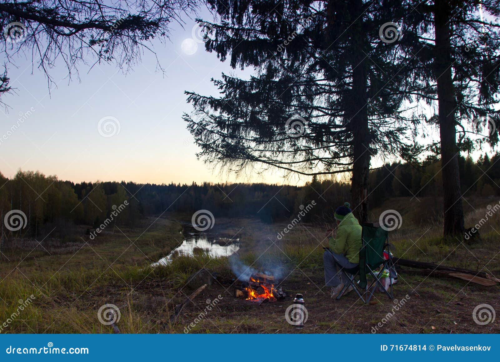 Sitting by the fire stock photo. Image of nature, landscape - 71674814