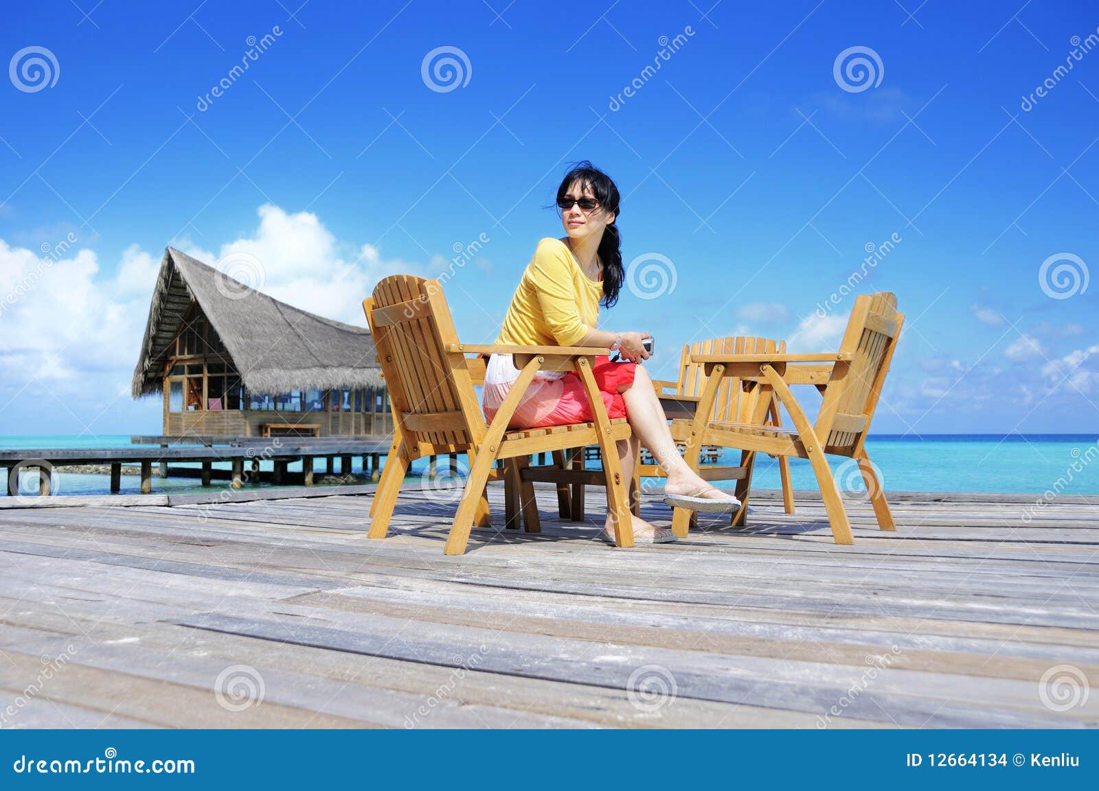 Sitting lady stock photo. Image of atoll, climate, azure - 12664134