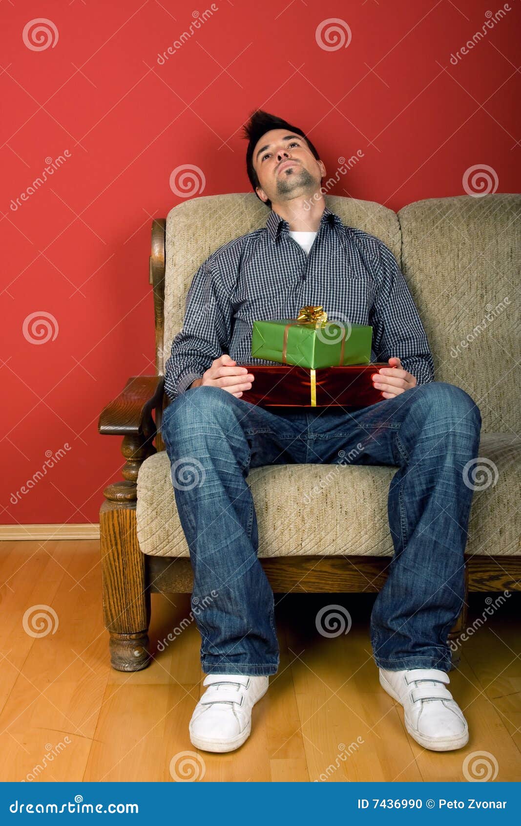 Sitting man with gift stock photo. Image of lying, waiting - 7436990