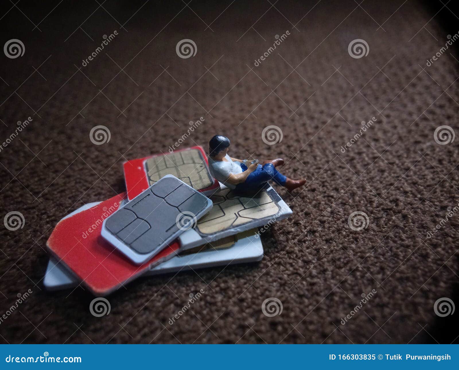 Sitting Man Holding Smartphone at SIM Card, Illustration for ...