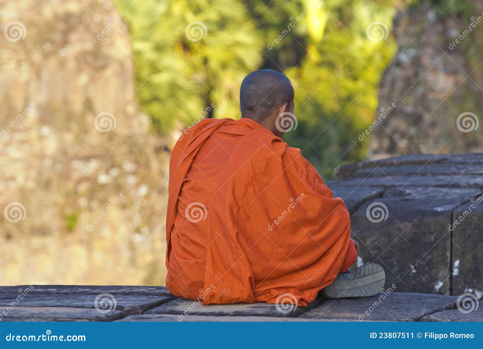 Sitting monk editorial photo. Image of touristic, male - 23807511