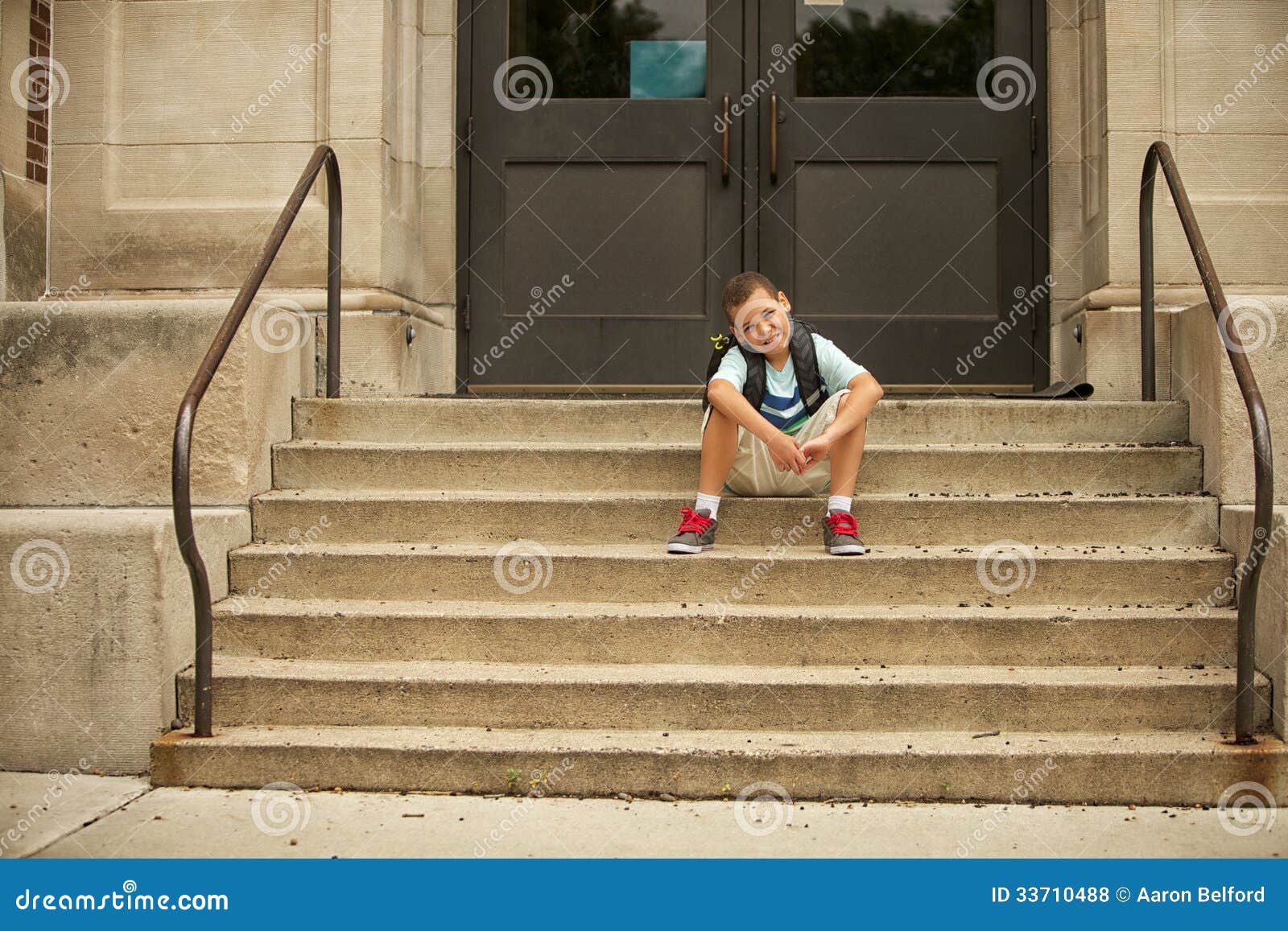 Sitting outside of school stock photo. Image of active - 33710488
