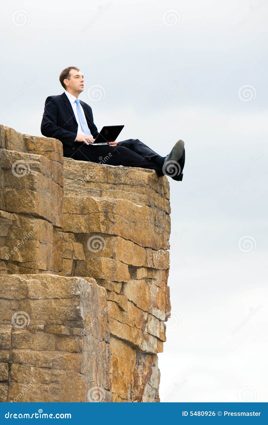 Sitting on the rocks stock photo. Image of peak, laptop - 5480926
