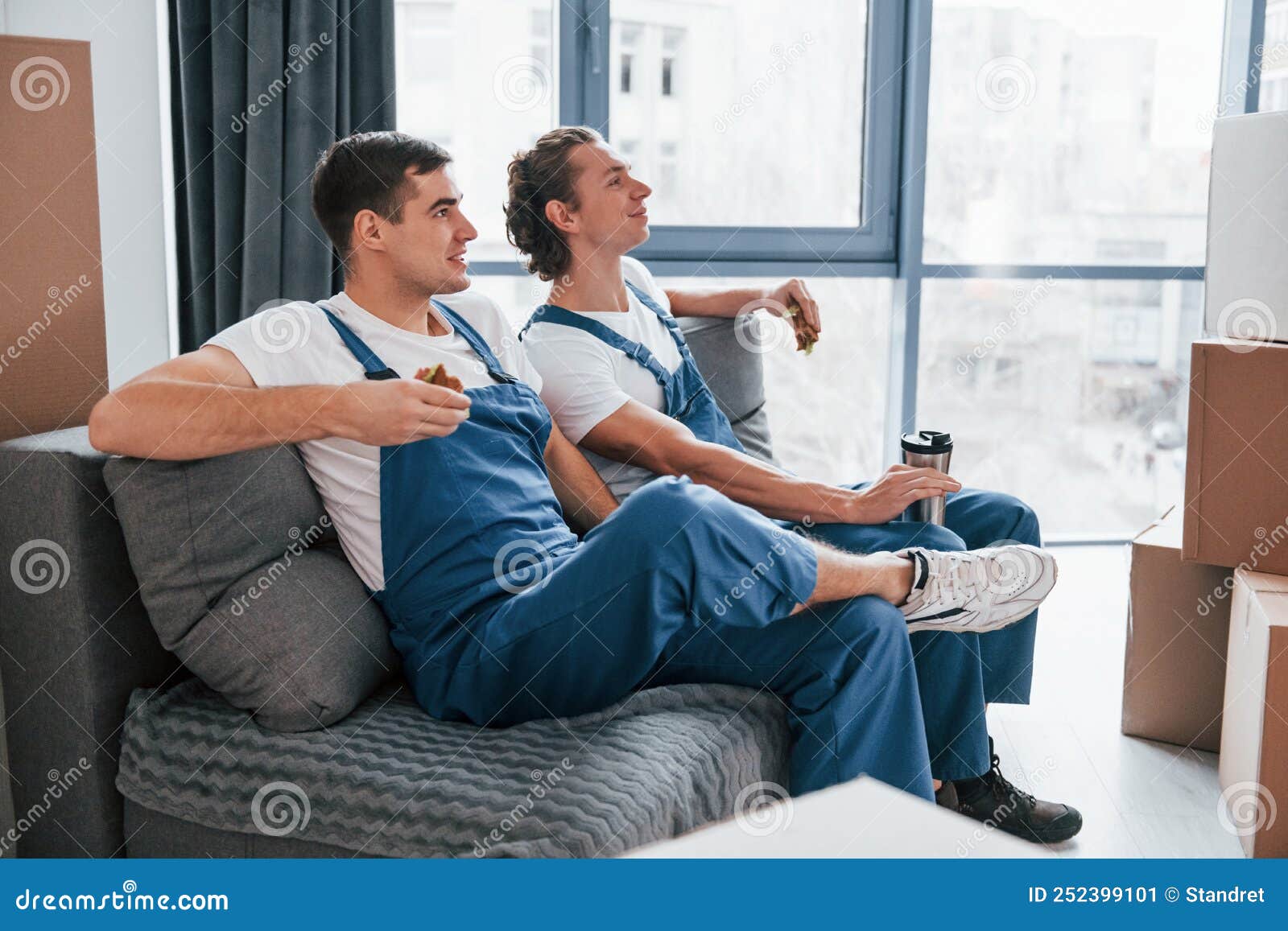 Sitting on the Sofa. Tired and Taking Break Stock Image - Image of ...