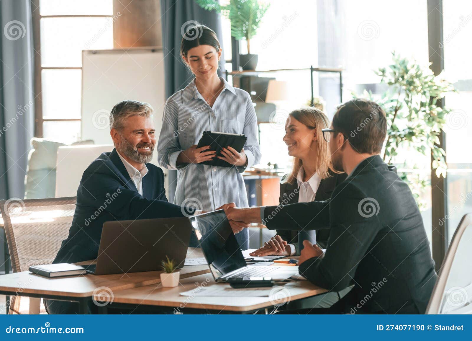 Sitting by the Table. Group of Business People are Working in the ...