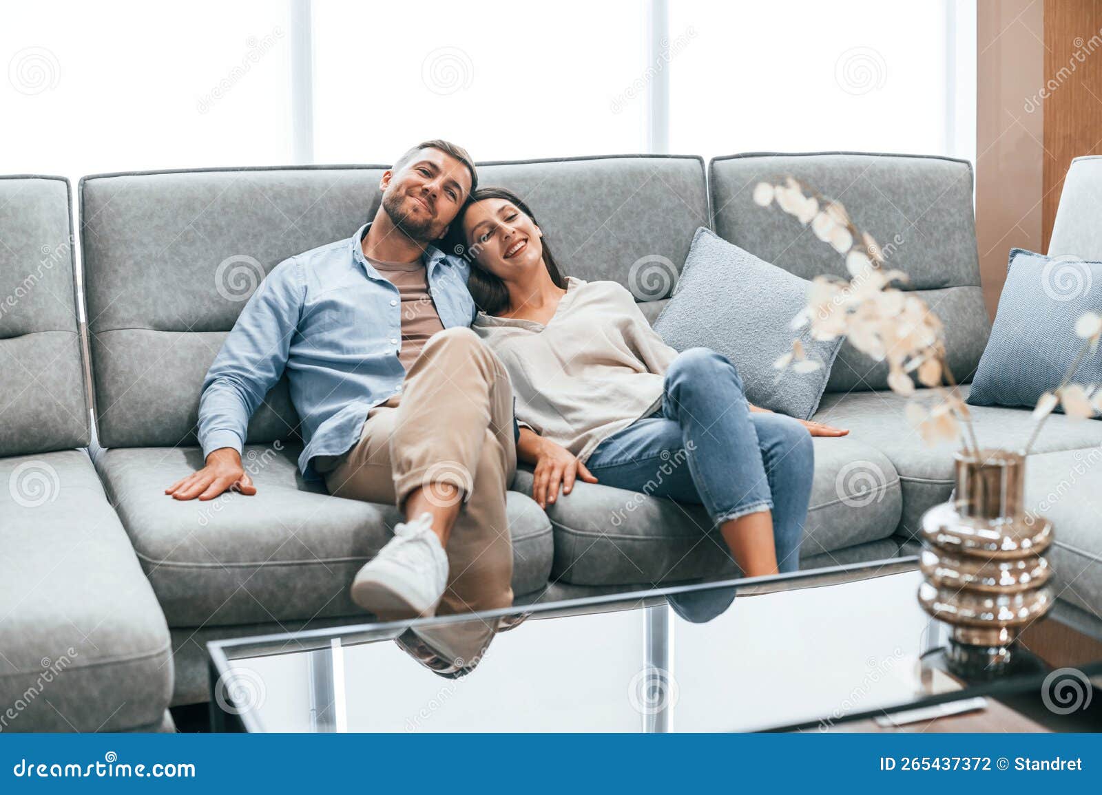 Sitting and Testing Product. Couple Choosing the Sofa and Bed in the ...