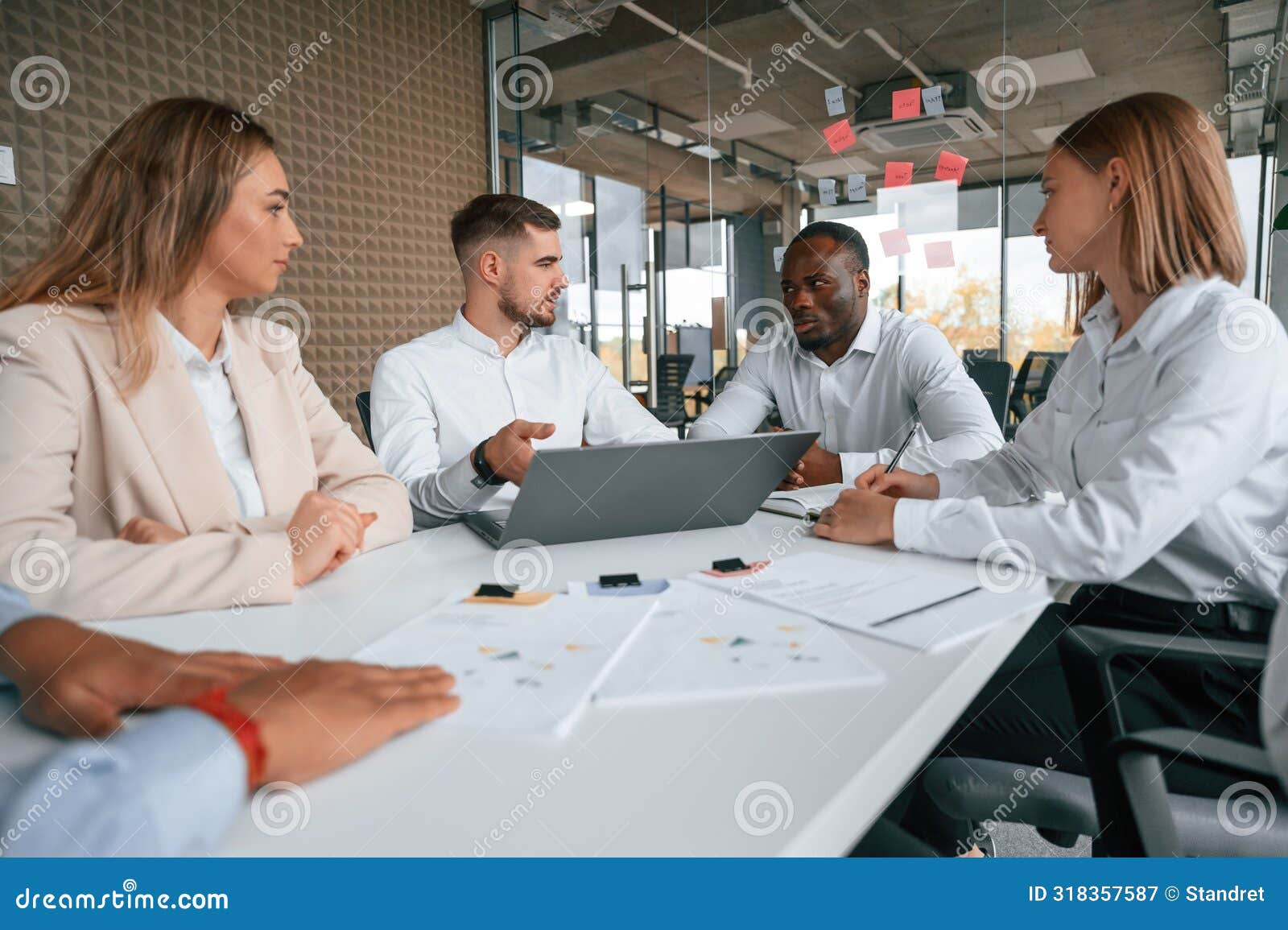 Sitting Together by the Table. Group of Office Workers are Indoors ...