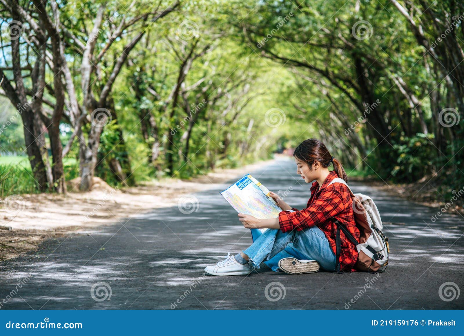 Sitting and Watching the Map on the Road Stock Photo - Image of nature ...