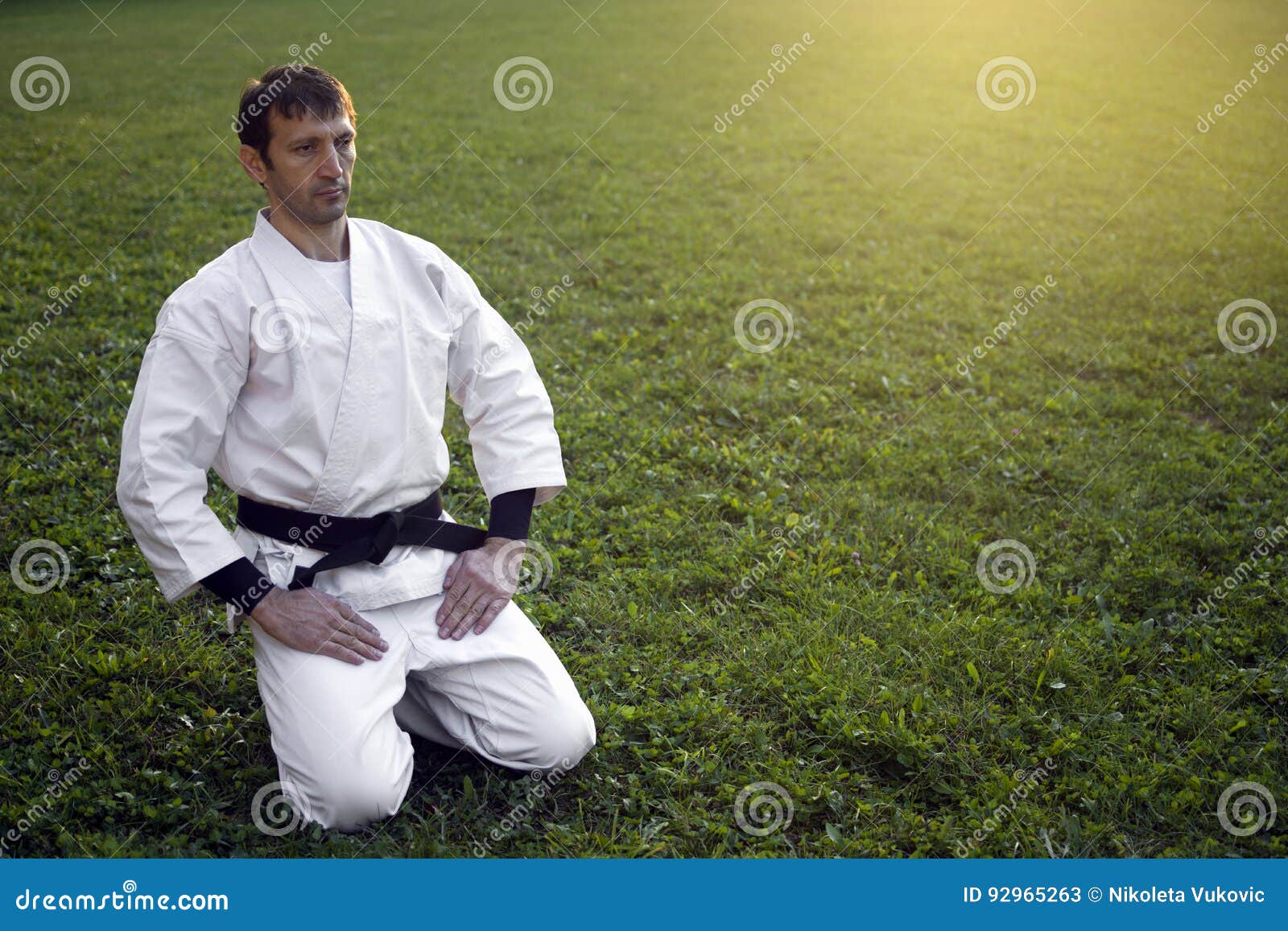Sitting white ninja stock image. Image of sitting, grass - 92965263