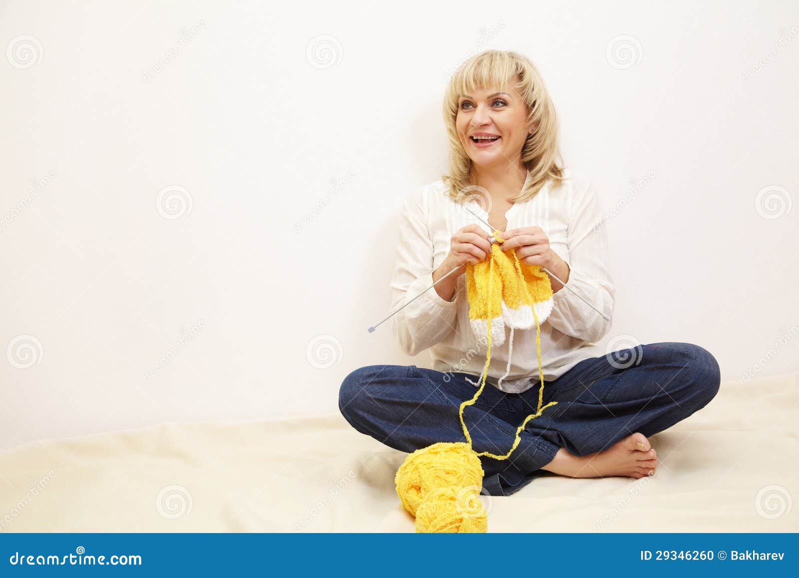Sitting woman knits stock photo. Image of toothy, female - 29346260