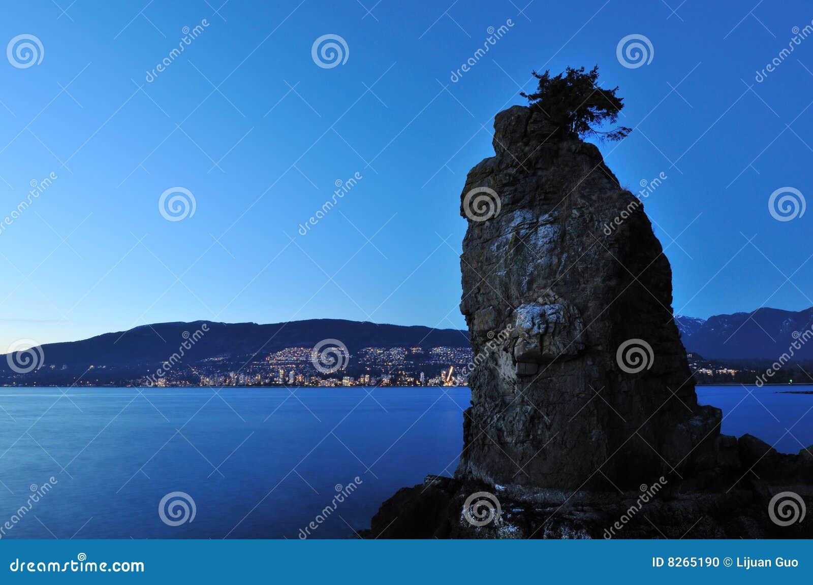 Siwash Rock in Stanley Park Stock Photo - Image of stanley, twilight ...