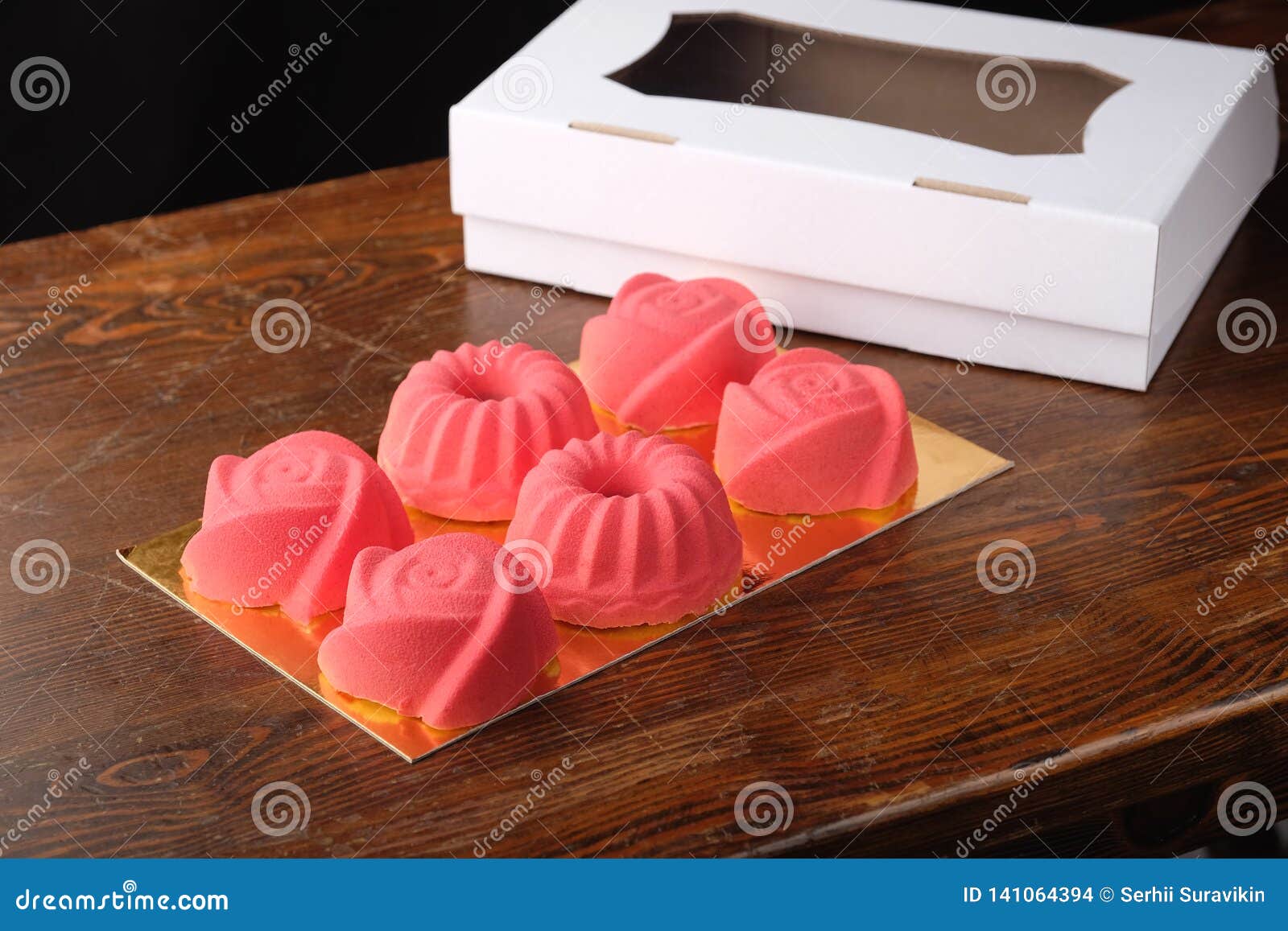 Six Assorted Mousse Cakes Near White Cake Box Stock Photo - Image of ...