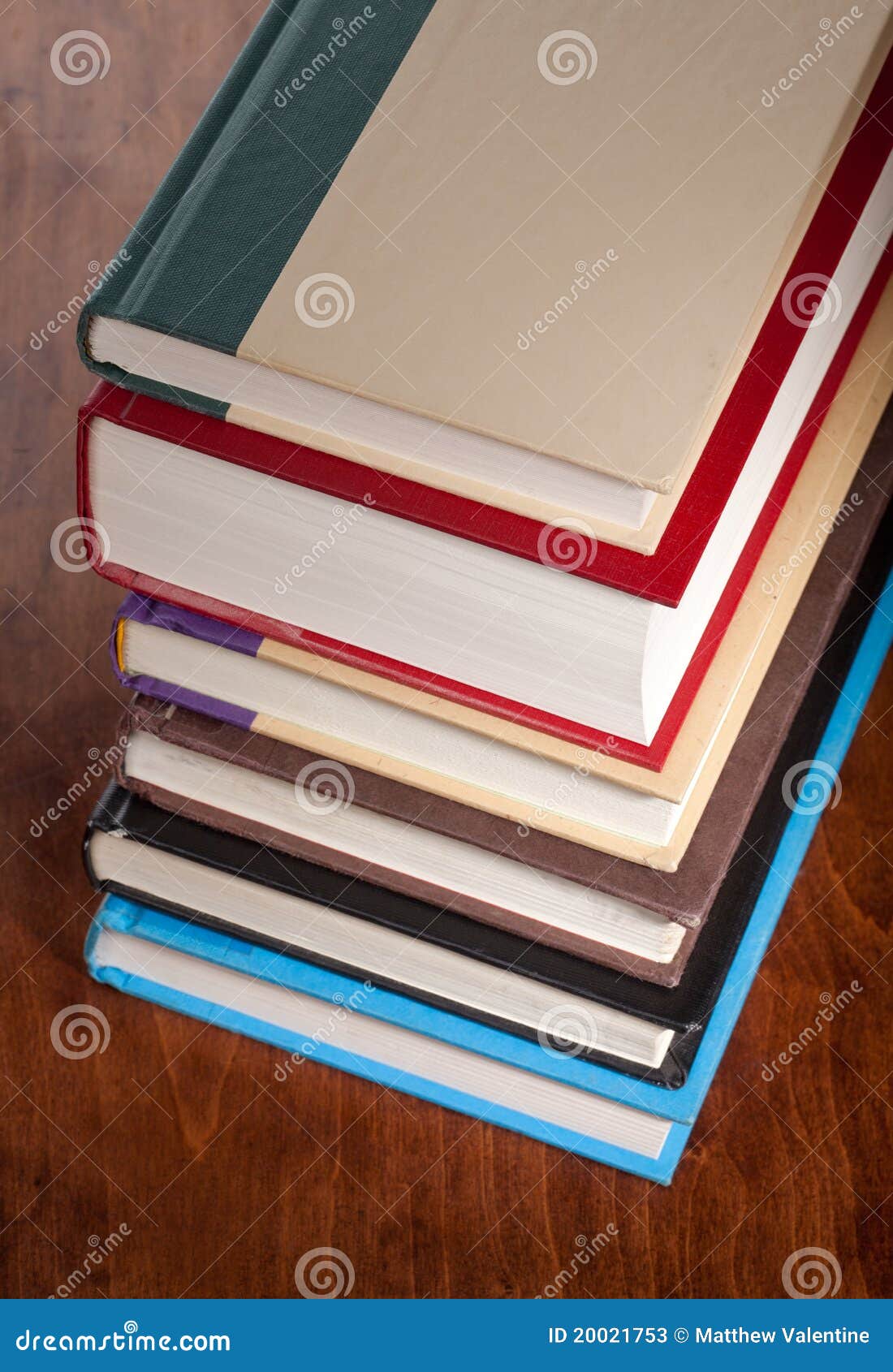 Six Books Stacked Neatly on a Table Stock Image - Image of vertical ...