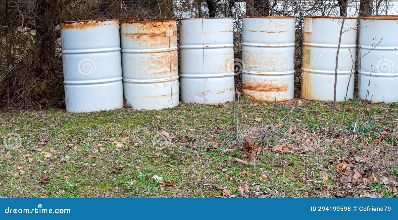 Six Corroded Round Storage Containers Lined Up Stock Photo - Image of ...