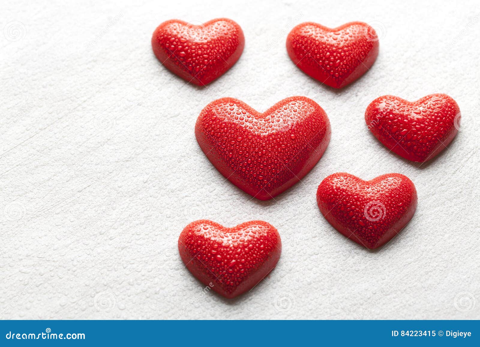 Six Figures in the Shape of a Heart Stock Image - Image of group, metal ...