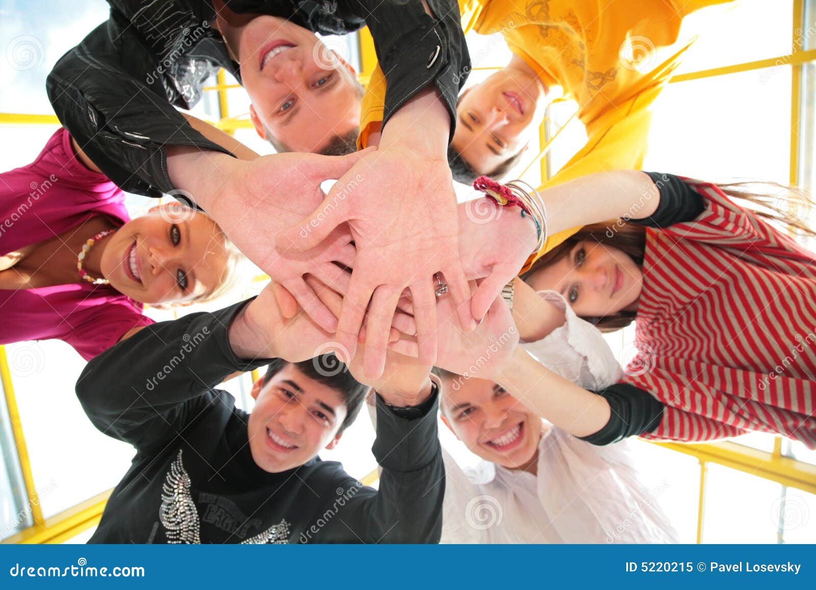 Six friends low angle view stock image. Image of scrum - 5220215