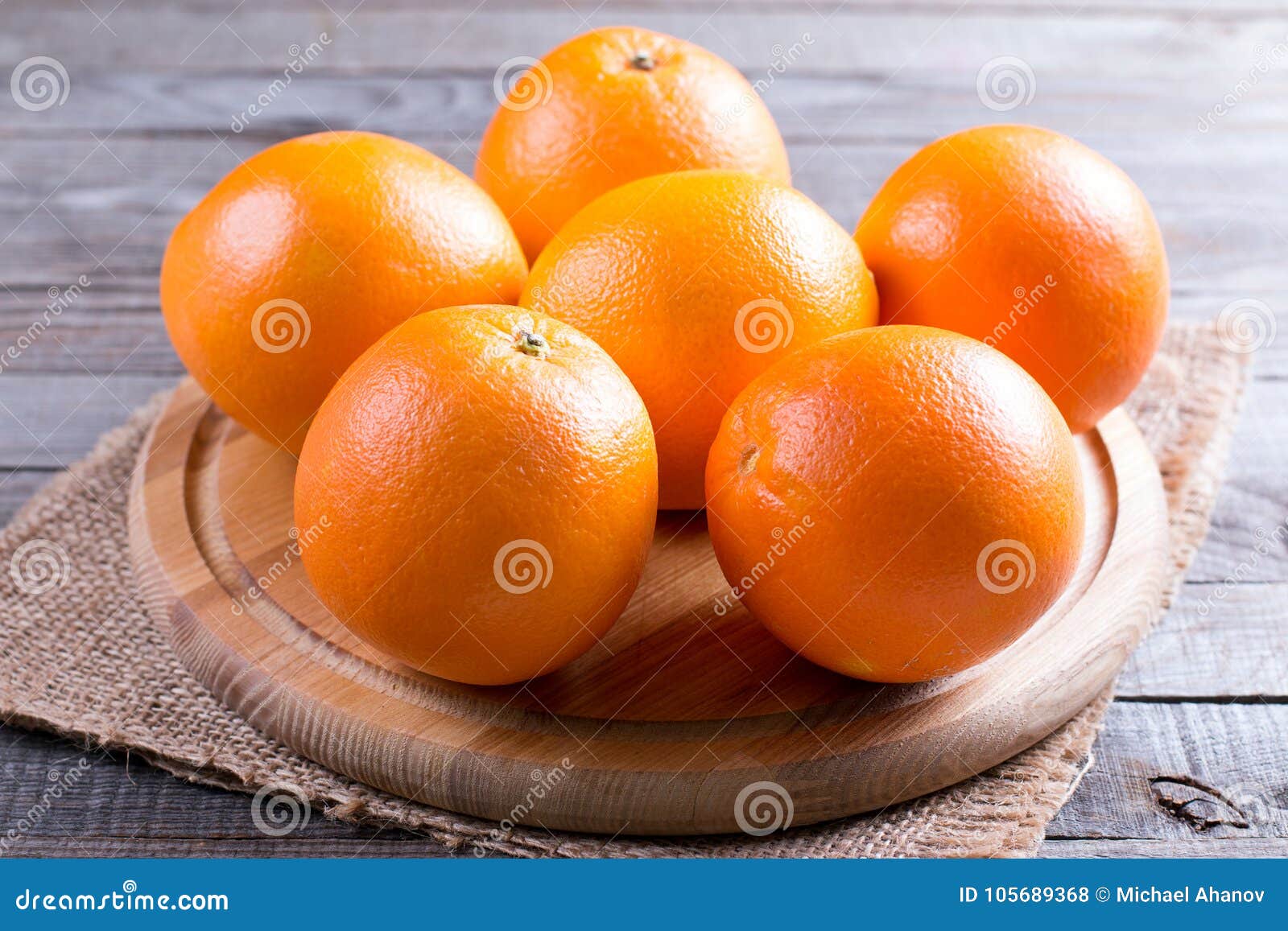Six Oranges on a Cutting Board Stock Photo - Image of ripe, brown ...